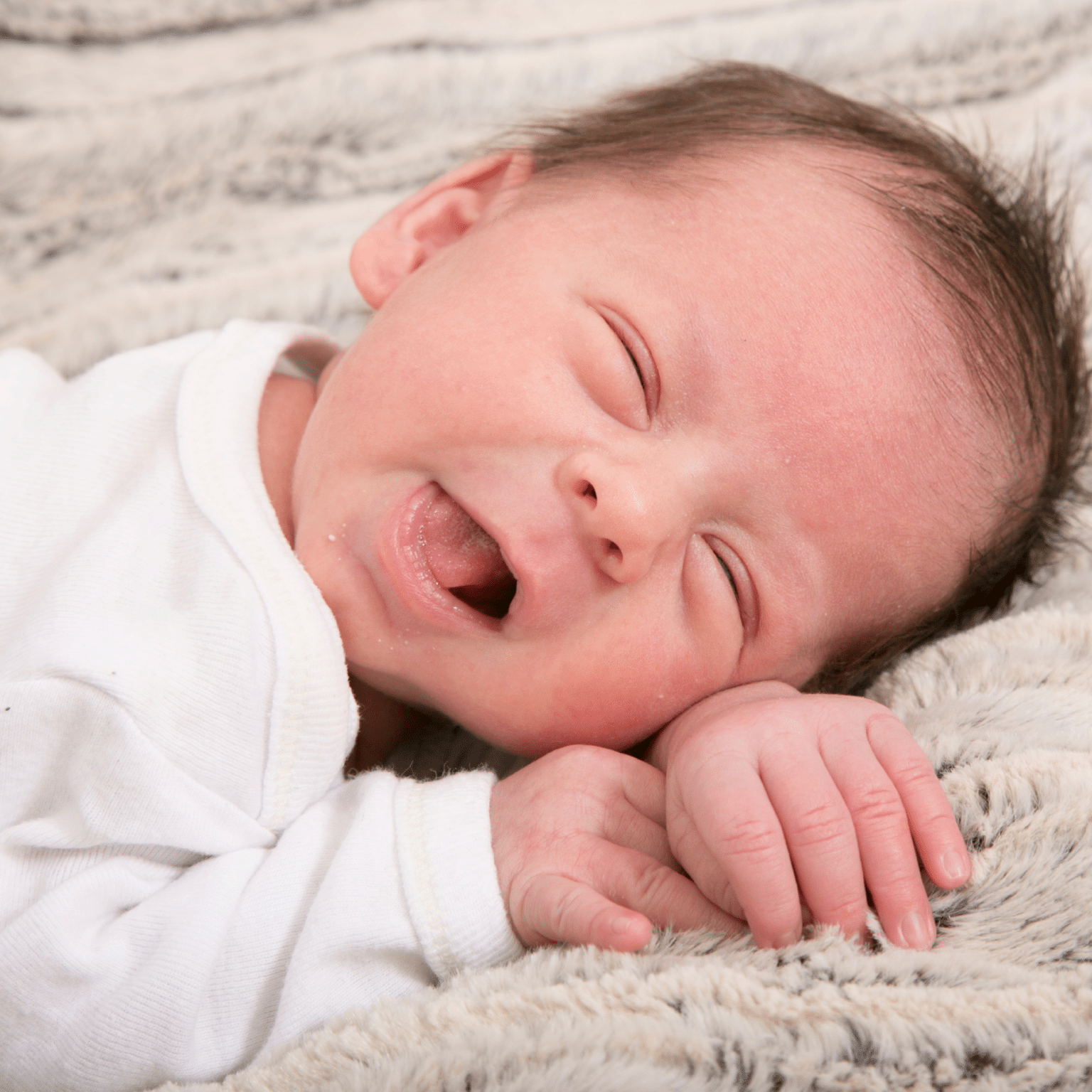 What Is The Spiritual Meaning Of Baby Laughing In Sleep? - On Your Journey